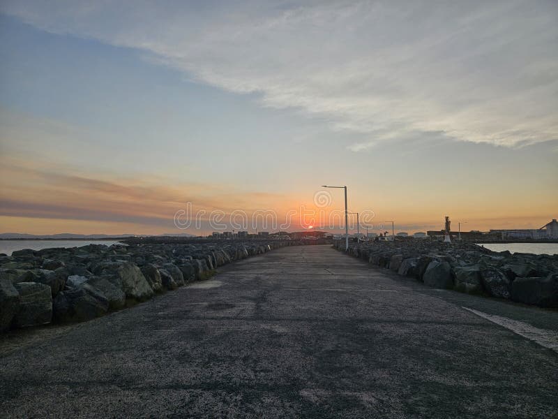 Sunset at the Breakwater Mackay Stock Photo - Image of tower, horizon ...