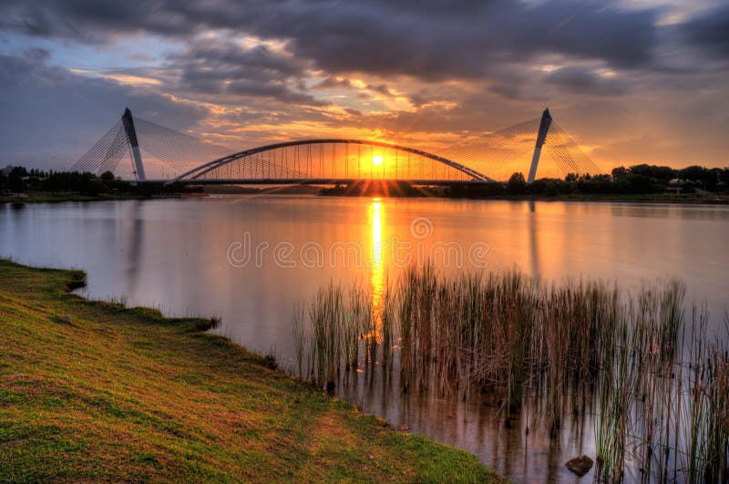 Sunset through a Bridge stock photo. Image of interest - 22897740