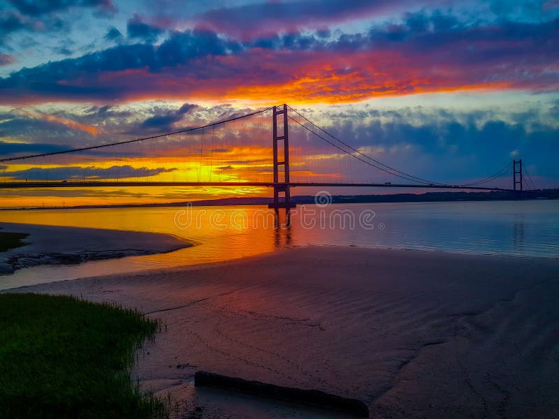 Sunset bridge to far stock photo. Image of bridge, water - 157132140