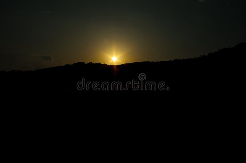 Sunset with Bright Glowing Sun Rays Dark Silhouette Landscape Little Sky Dramatic Scene Evening ...