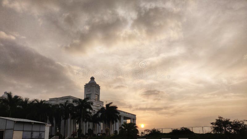 Sunset building stock photo. Image of cloud, morning - 218639348