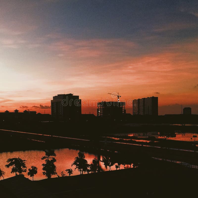 Sunset Building Panorama stock photo. Image of skyline - 208984482