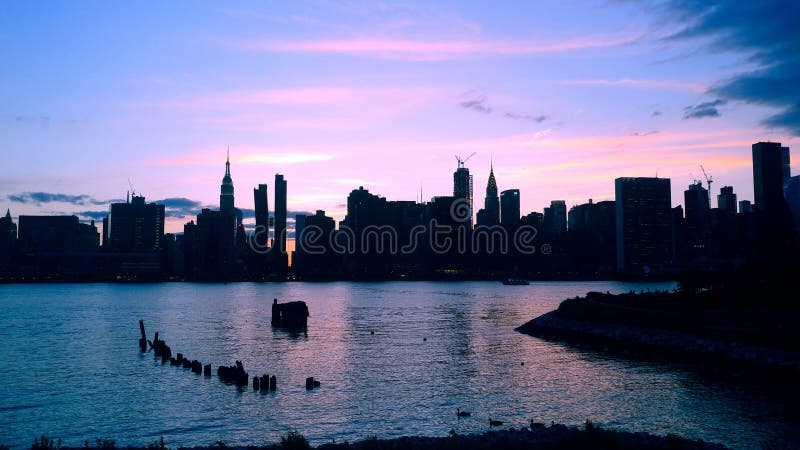 Sunset between Buildings on Manhattan New York Stock Photo - Image of ...