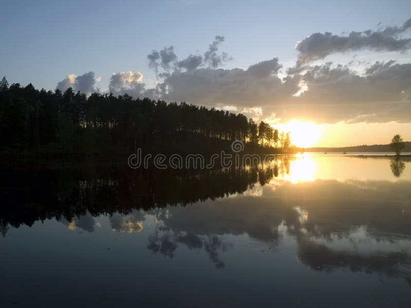 Sunset on the Calm Forest Lake Stock Image - Image of radial, beauty ...