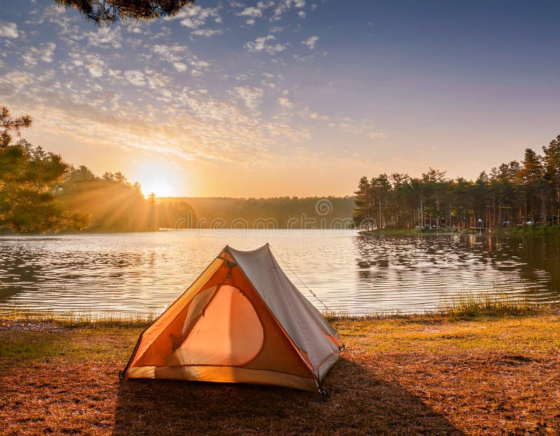 Sunset at Campsite Next To Lake Stock Photo - Image of activity ...