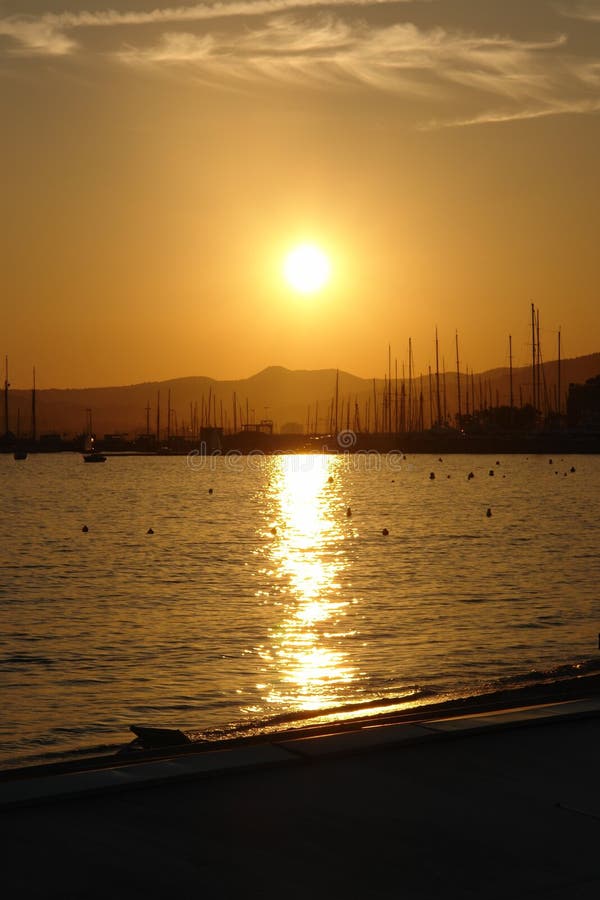 Sunset in Cannes bay stock photo. Image of boats, coast - 1664526