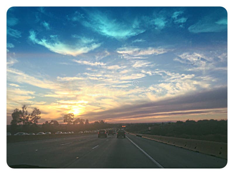 Sunset from the car editorial stock photo. Image of freeway - 90909313