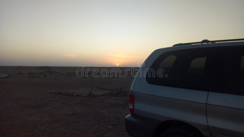 Sunset through a Car Windshield in the Desert at the Beginning of ...