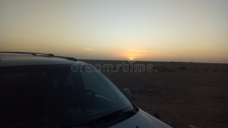 Sunset through a Car Windshield in the Desert at the Beginning of ...