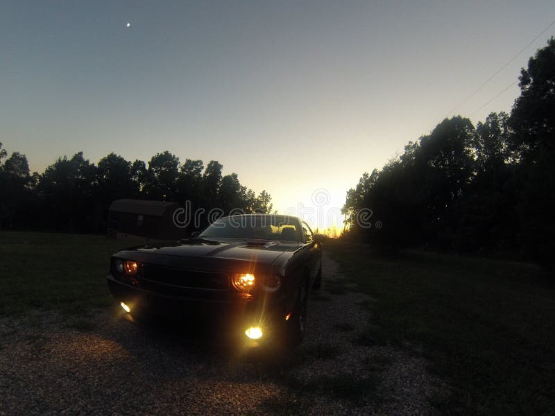 Sunset Challenger stock image. Image of reflection, tree - 54091031