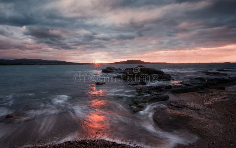 Sunset at Chernomorets, Bulgaria Stock Photo - Image of shore, stone ...