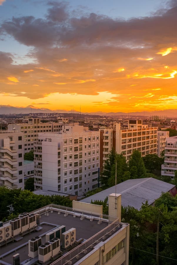 Sunset in Chofu City stock image. Image of evening, areas - 261494407