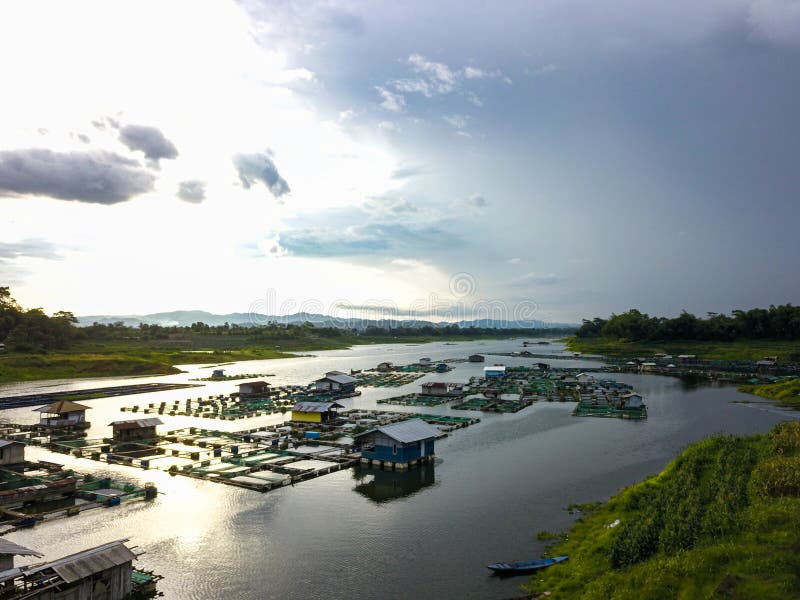 Sunset at Citarum river stock photo. Image of river - 274559030