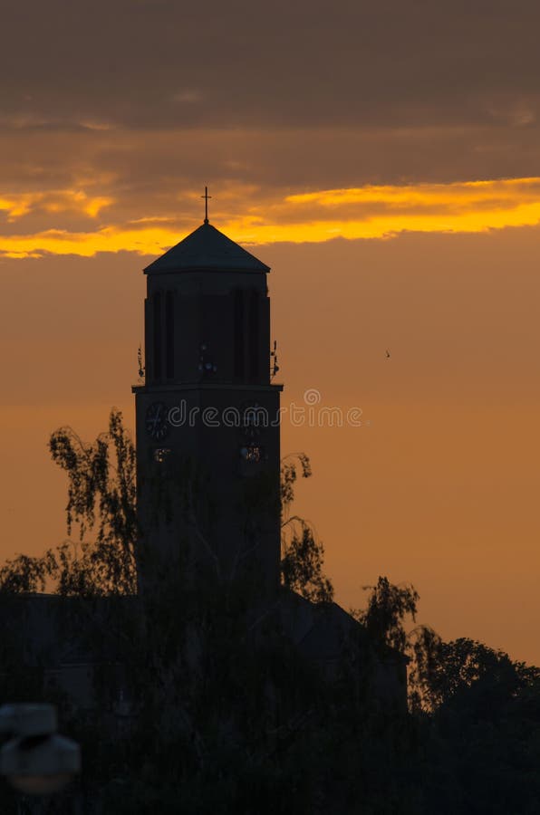 Sunset with city hall stock image. Image of sunrise, west - 97780361