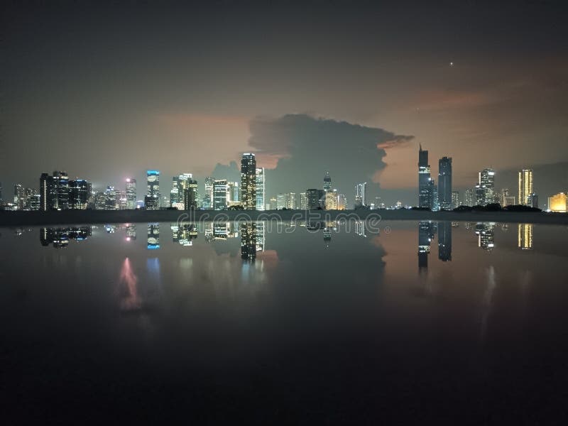 Sunset in the City of Jakarta in the Shadow of the Water Stock Image ...