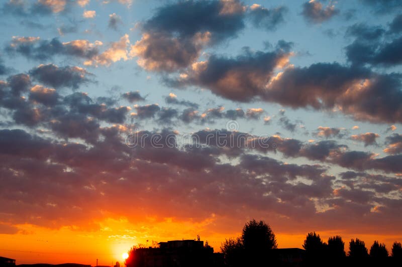 Three color sunset stock photo. Image of sunsets, volume - 53616700