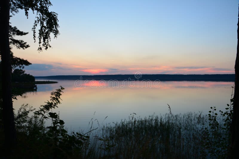 Sunset on the clam. stock photo. Image of forest, tourist - 230007018