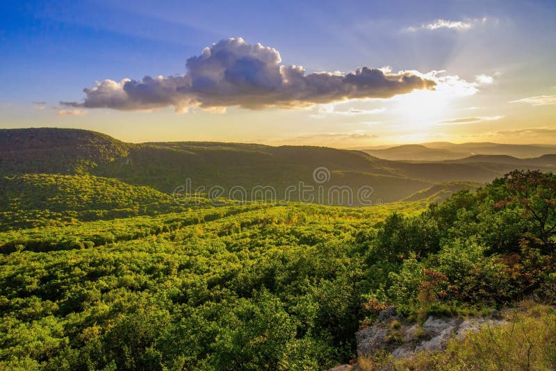 Sunset at the hillside stock photo. Image of beautiful - 104078744