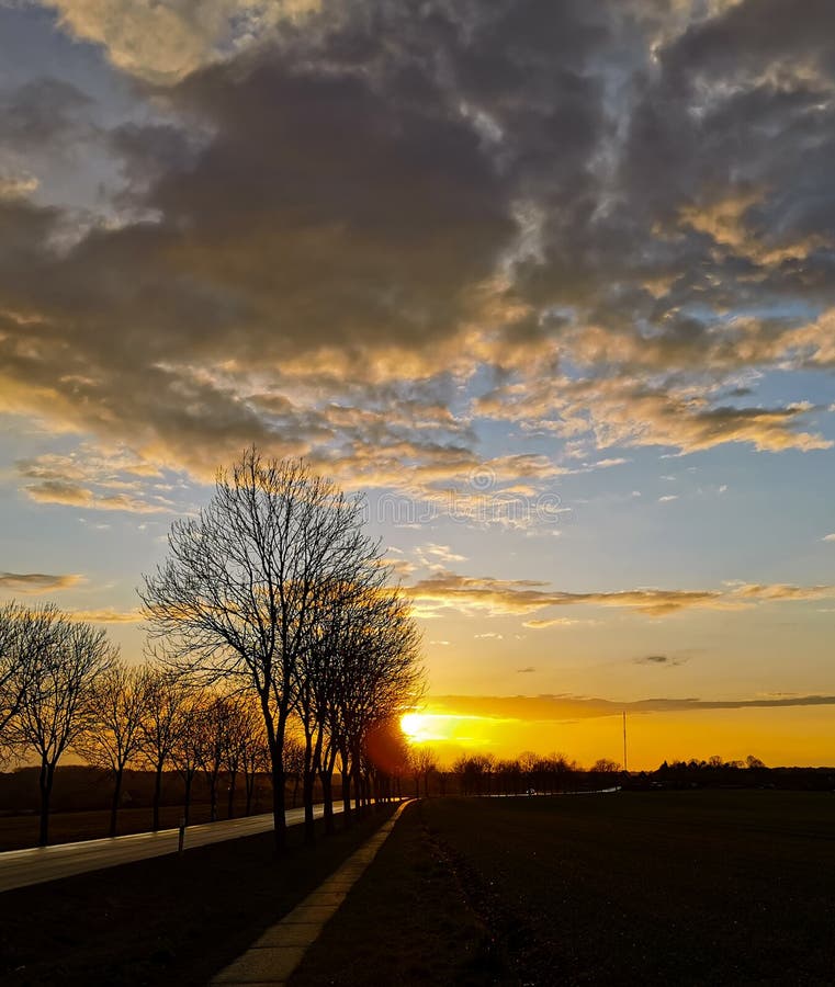 Sunset and Cloud Play on the Edge of the Field Stock Image - Image of ...