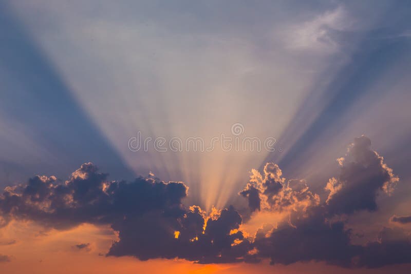 Sunset with sun rays stock photo. Image of outdoors - 100557002