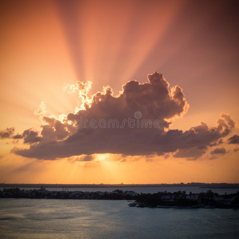 Sunset through clouds stock image. Image of beach, maldives - 190356927