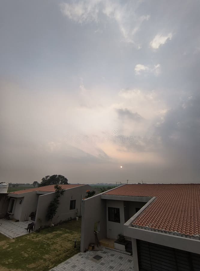 Sunset Clouds and Ceiling of a House Stock Photo - Image of ceiling ...