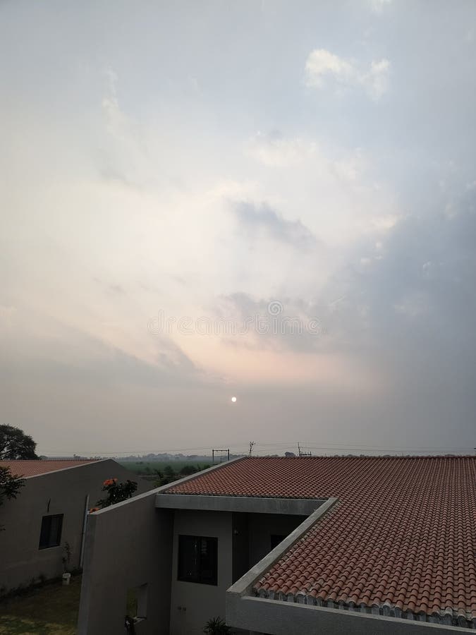 Sunset Clouds and Ceiling of a House Stock Photo - Image of ceiling ...