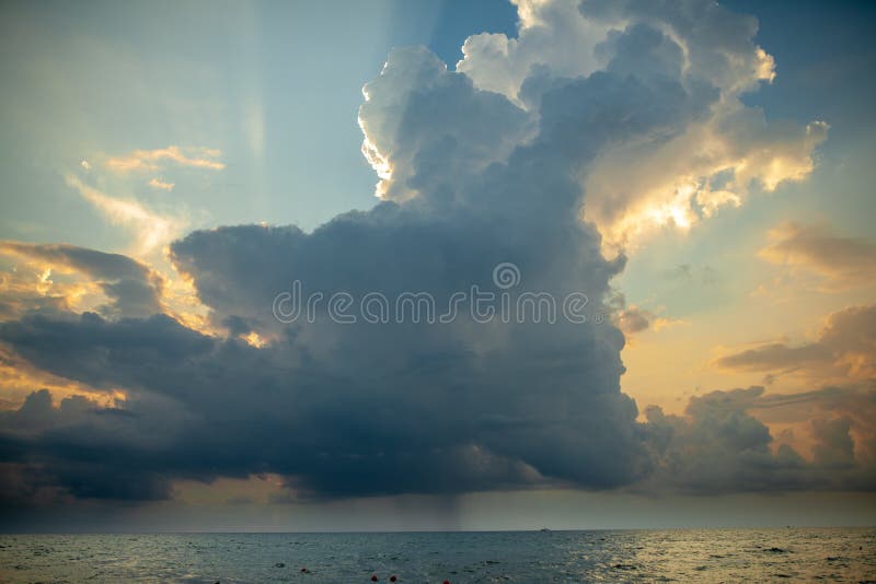Sunset with Clouds, Light Rays and Other Atmospheric Effect. Dramatic ...
