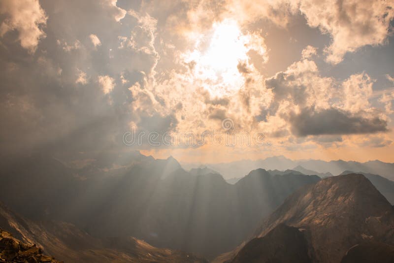 Sunset between Clouds and Mountains. Dramatic Mountain Scenary Stock ...
