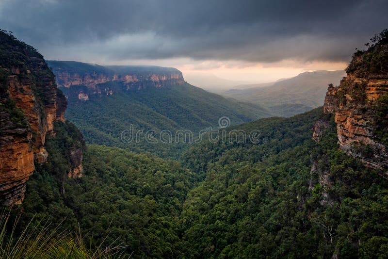 Sunset and Clouds Over Blue Mountains Stock Photo - Image of clouds ...