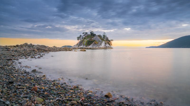 Sunset Clouds Over at Whyte Islet Stock Photo - Image of tree, rock ...