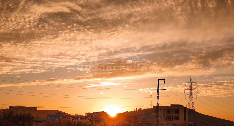 Sunset through Clouds and Powerlines Stock Photo - Image of lines ...