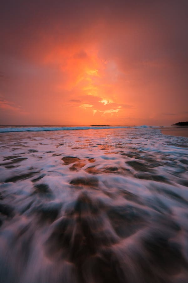 Sunset Clouds and Waves on Empty Beach Stock Image - Image of movement ...