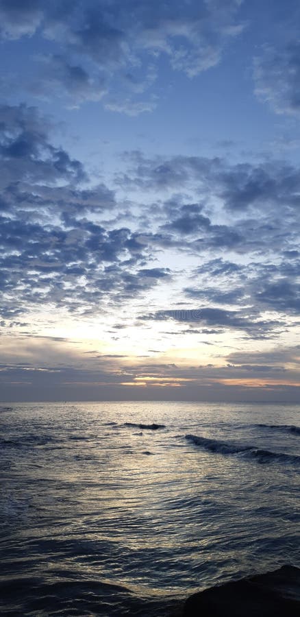 Sunset on Cloudy Day - Pasongsongan Beach Stock Image - Image of ...