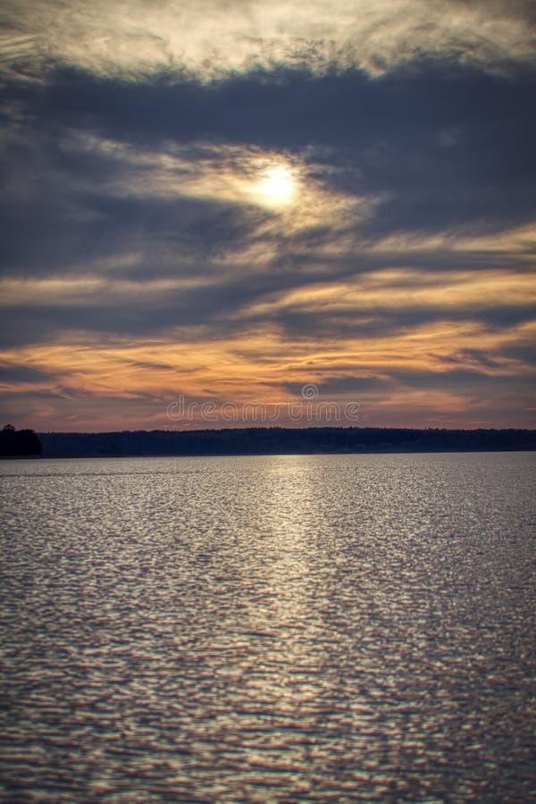 Sunset in Cloudy Weather Over the Lake Stock Image - Image of scene ...