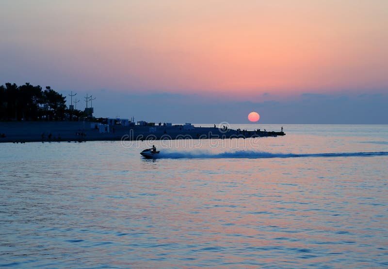 Sunset on the Coast with a Rest People Stock Image - Image of coast ...