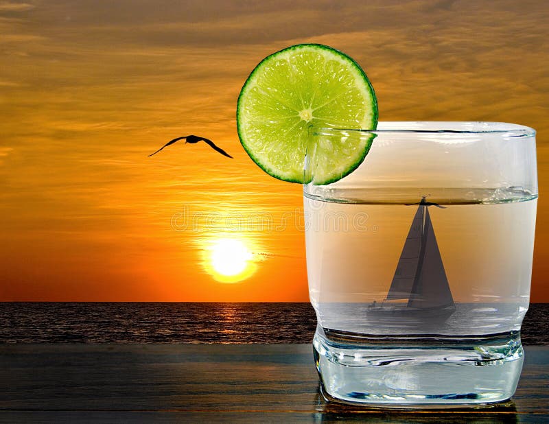 Sunset Cocktail With Sailboat Stock Image - Image of fruit, sailboat ...