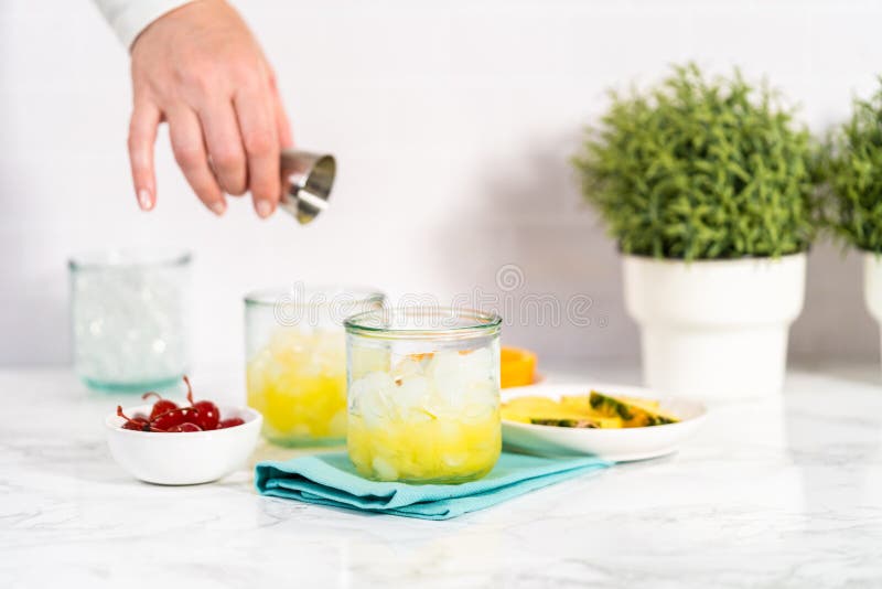 Sunset cocktail stock image. Image of beverage, cabinet - 270775091