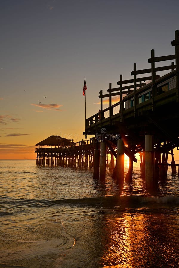Sunset at Cocoa Beach Pier, Florida Stock Image - Image of clouds, pier ...