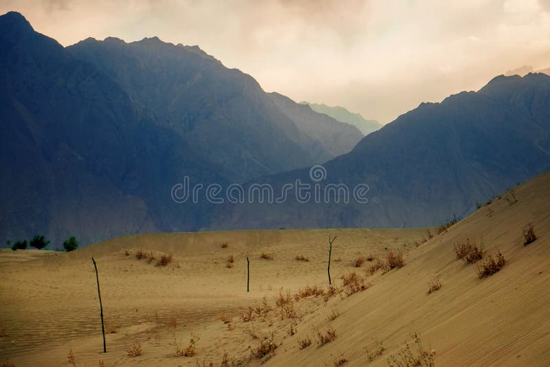 Sunset at Cold Desert with Beutiful Layer of Mountains Stock Photo ...