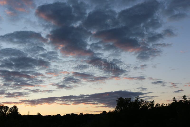 Sunset Colored Clouds in the Sky Stock Photo - Image of bright, orange ...