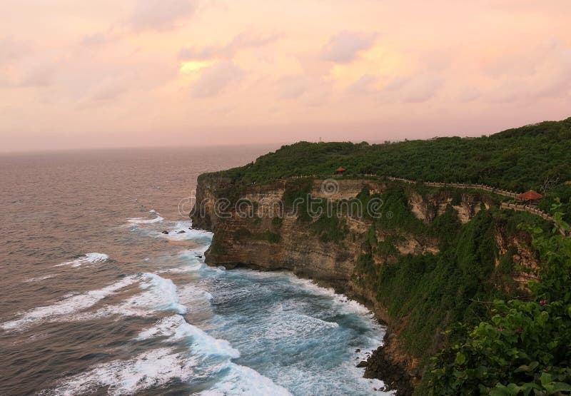 Sunset colors in Bali stock photo. Image of uluwatu, waves - 78104232