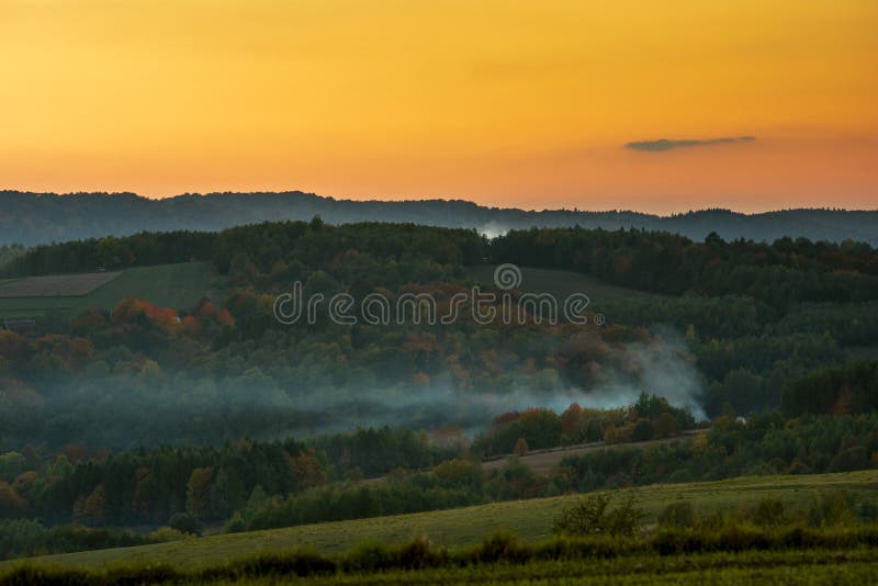 Sunset Colors Over Forests and Fields, Smoke Over Trees Stock Photo ...