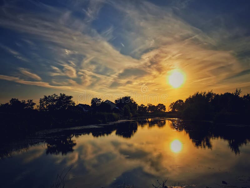 Sunset in colours stock photo. Image of reflection, sunset - 192558730