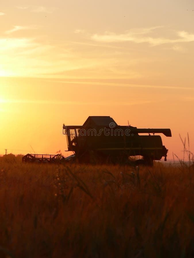 Sunset Combine Harvester stock image. Image of farmer - 2927745