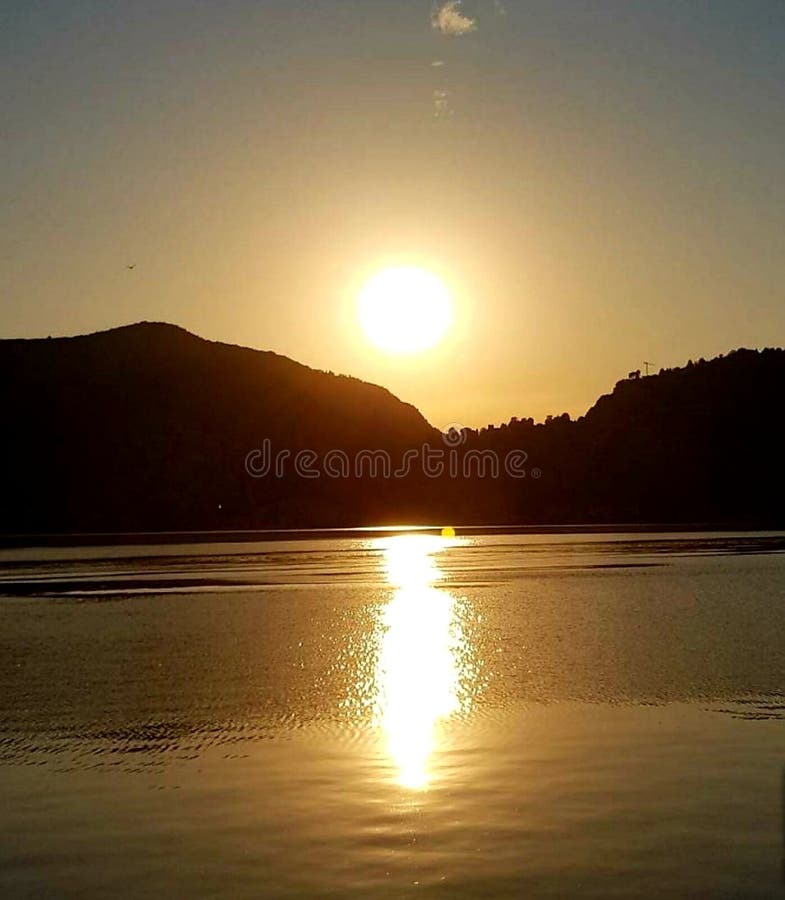 Sunset in Como stock photo. Image of light, evening - 228293560