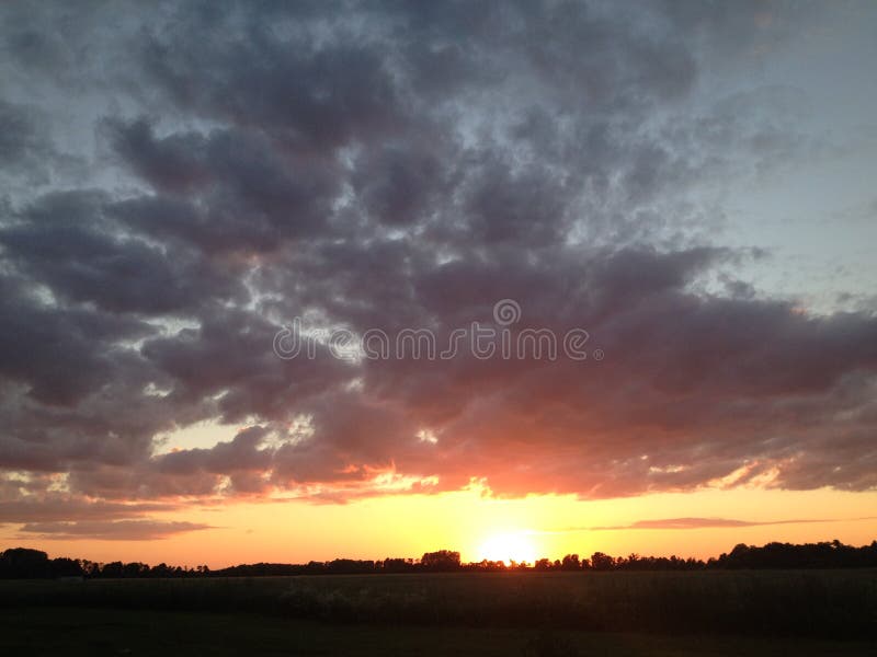 Sunset at the country side stock image. Image of sunset - 49839701