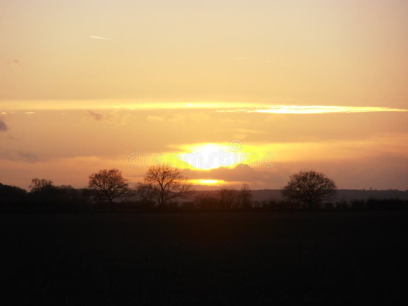 Sunset in the Countryside stock photo. Image of orange - 154705438