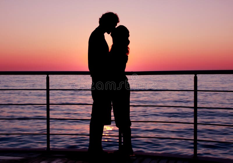 Sunset couple stock image. Image of passion, holding - 50241847