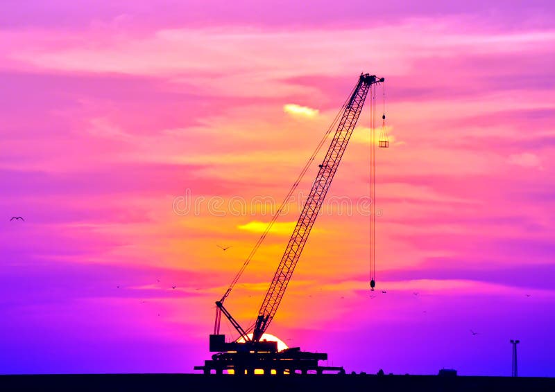 Sunset and crane stock image. Image of commerce, boat - 24617377